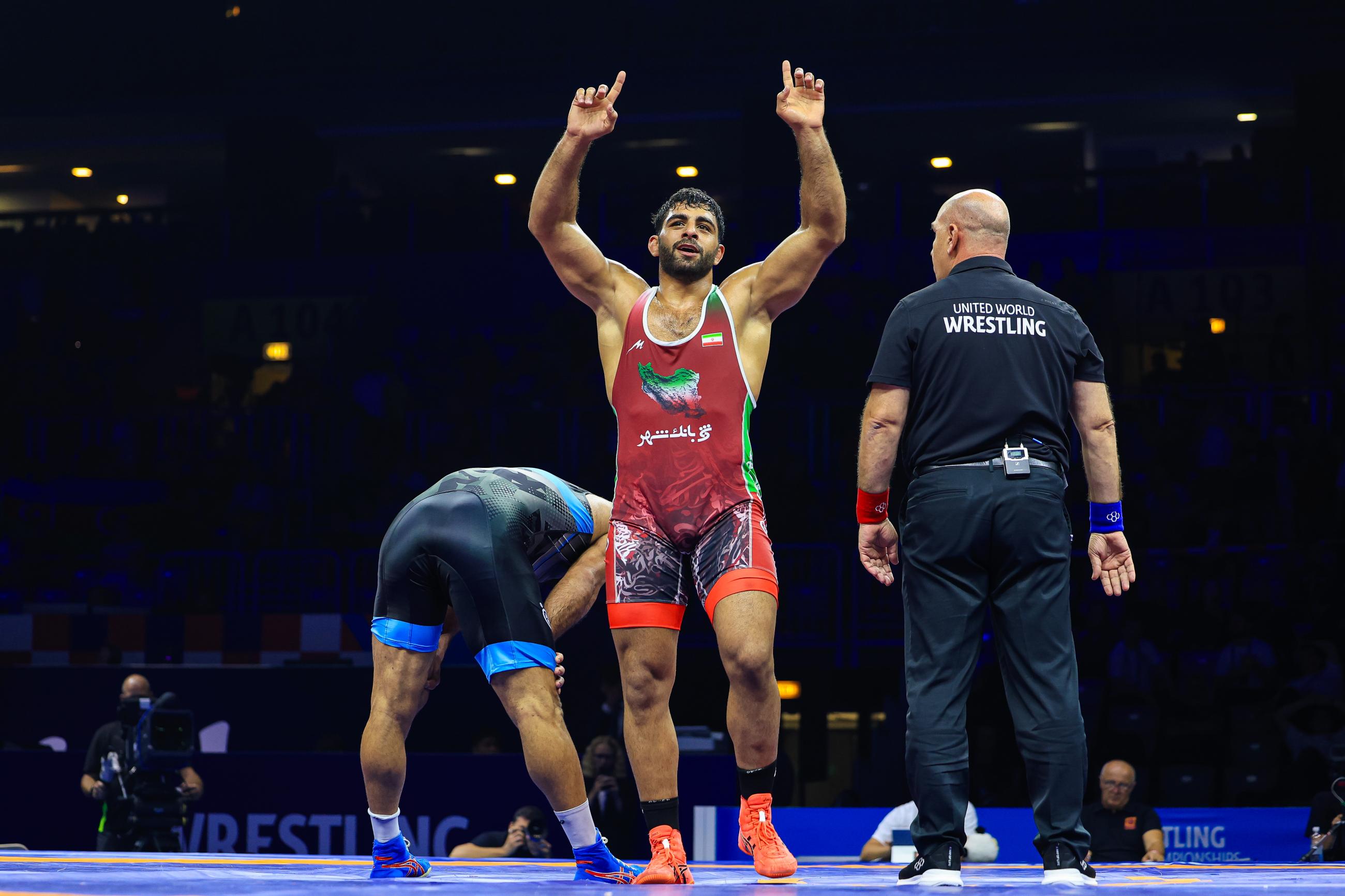 Olympic champ Saravi reclaims world title in stacked 97kg division ...